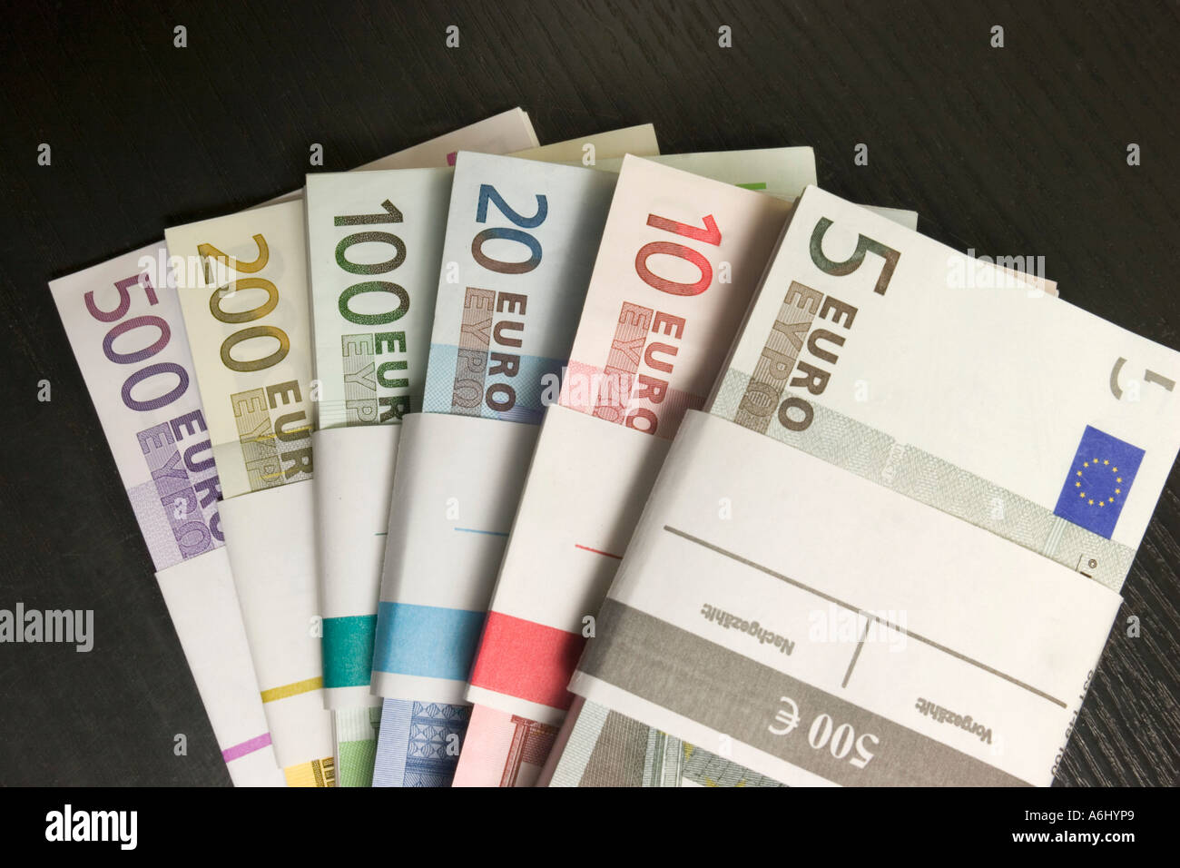 Bundles of money, euro banknotes Stock Photo - Alamy