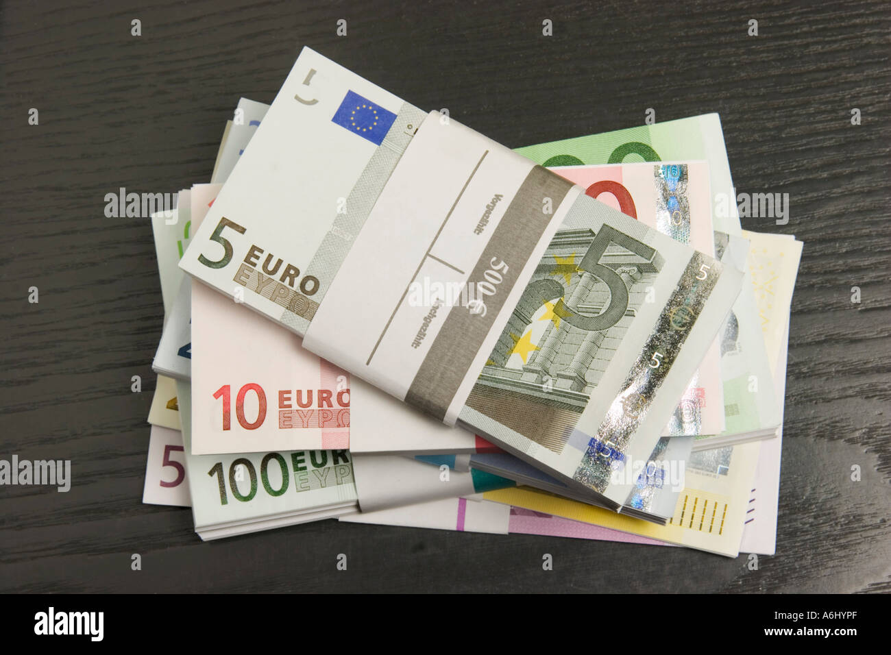 Bundles of money, euro banknotes Stock Photo - Alamy
