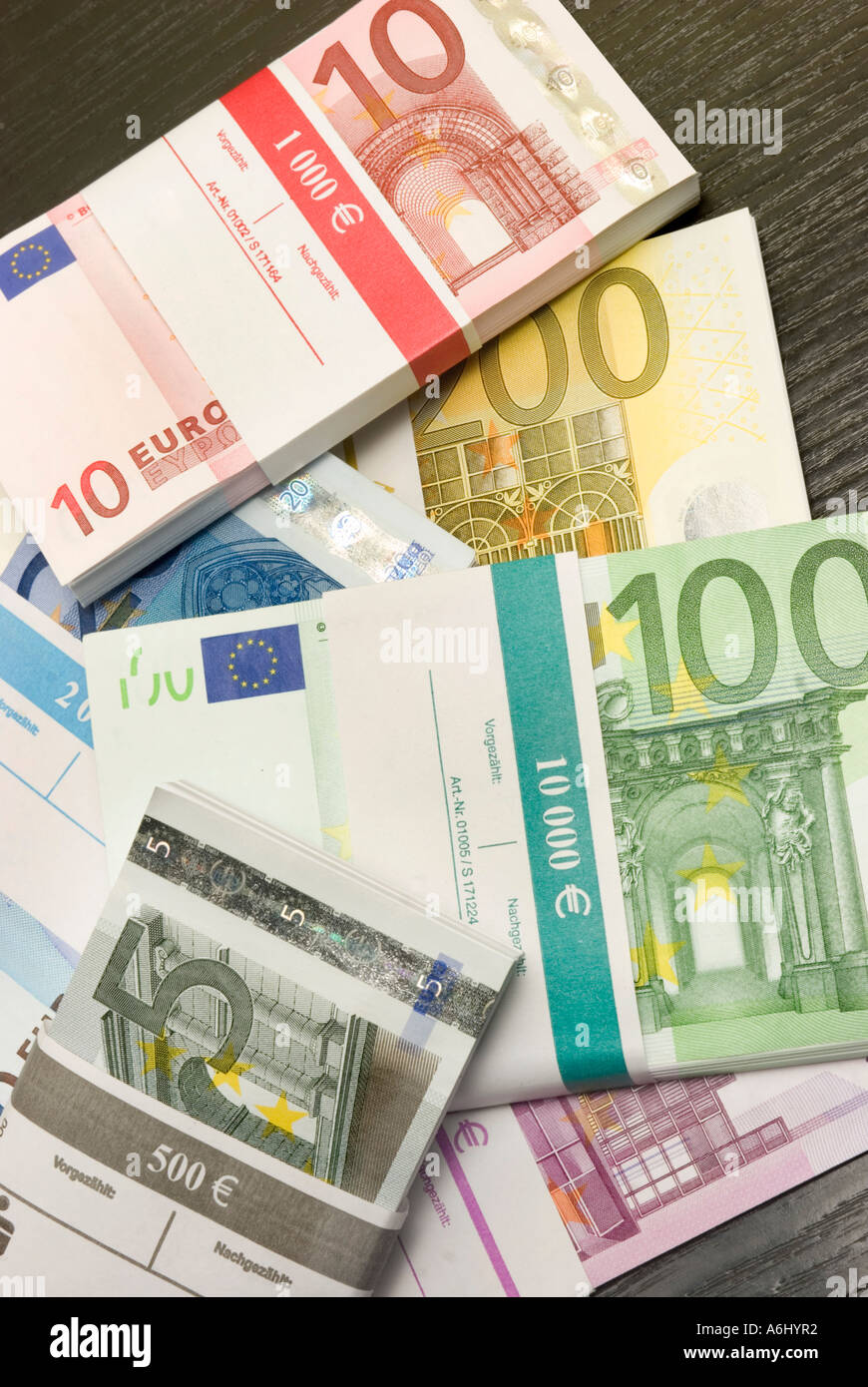 Bundles of money, euro banknotes Stock Photo - Alamy