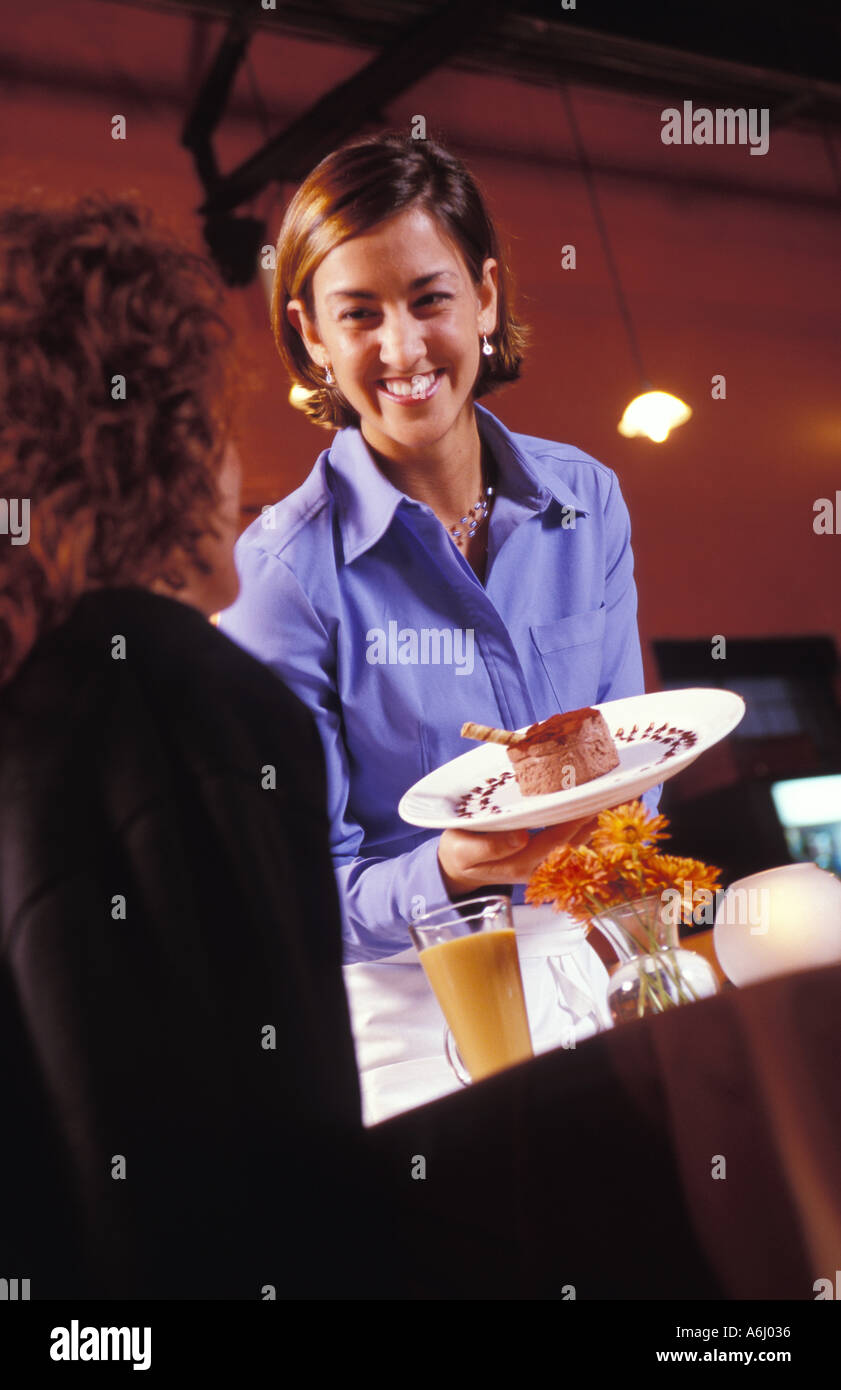 Happy Waitress Serving Dessert Stock Photo - Alamy Happy Waitress Serving Dessert Stock Photo - Alamy