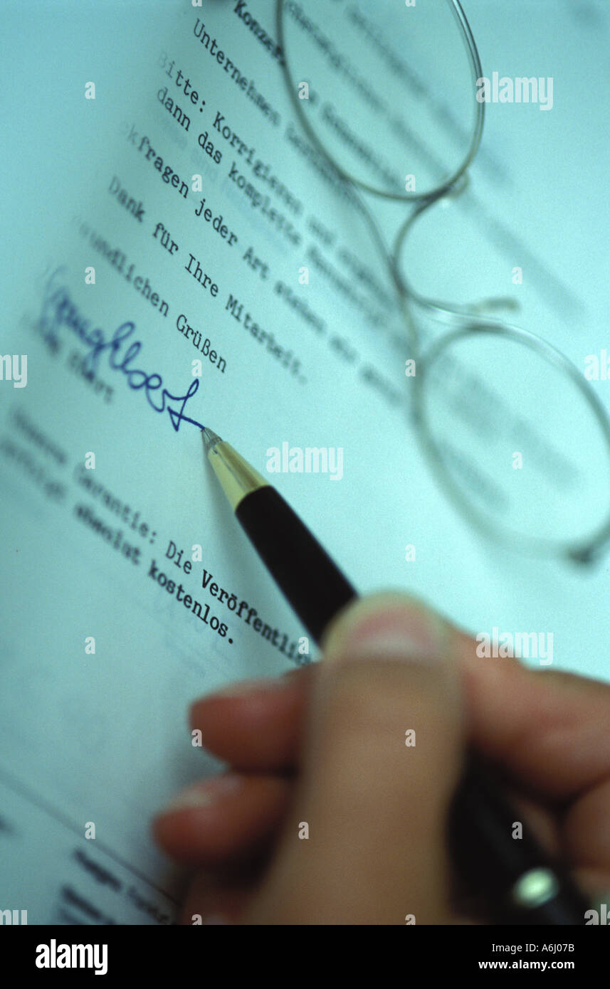 Signing a German Document Stock Photo - Alamy