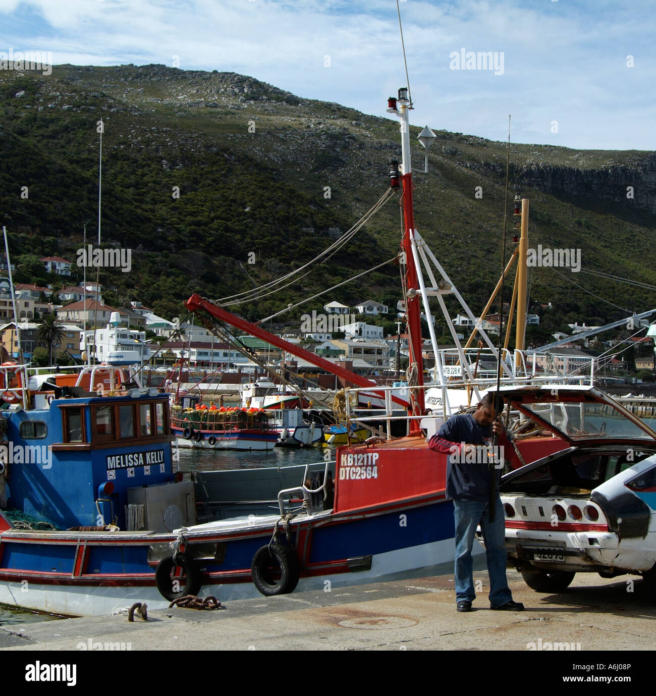 Fisherman at Kalk Bay Harbour western cape South Africa Stock Photo - Alamy
