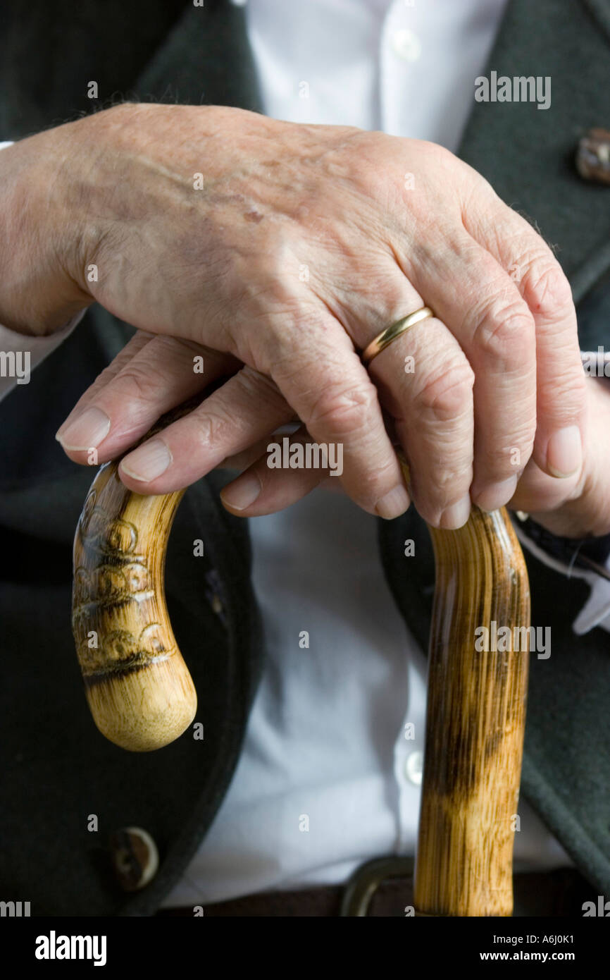 Old man with walking stick Stock Photo - Alamy