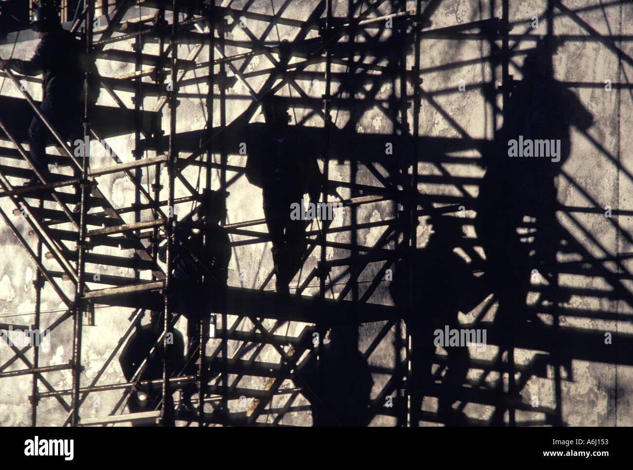 Workers on Scaffolding Stock Photo - Alamy