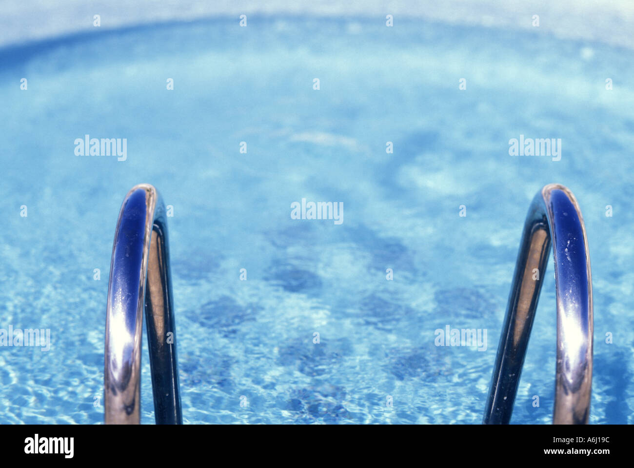 Ladder Going Into Swimming Pool Stock Photo - Alamy