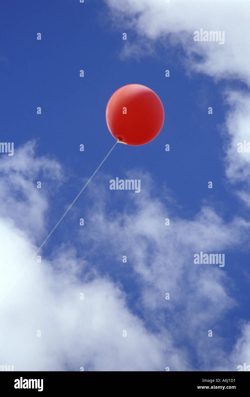 Red Balloon and Blue Sky Stock Photo - Alamy