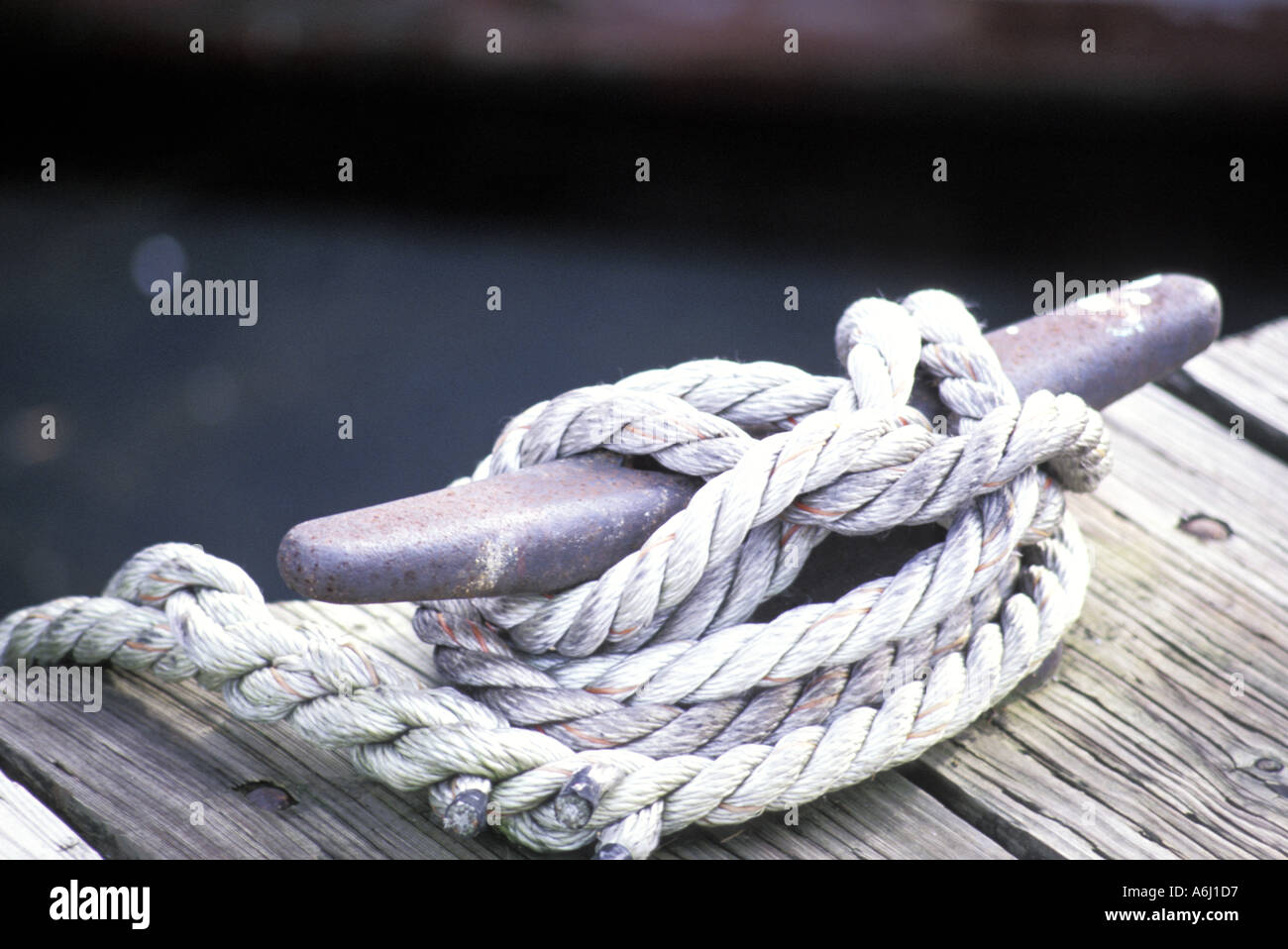 Rope Tied to Dock Stock Photo - Alamy