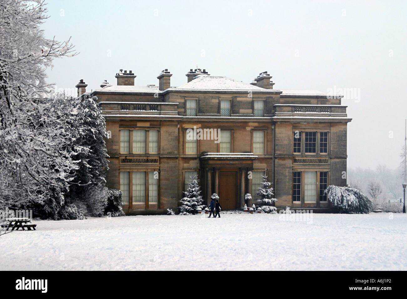 Country manor house in snow covered parkland Stock Photo - Alamy