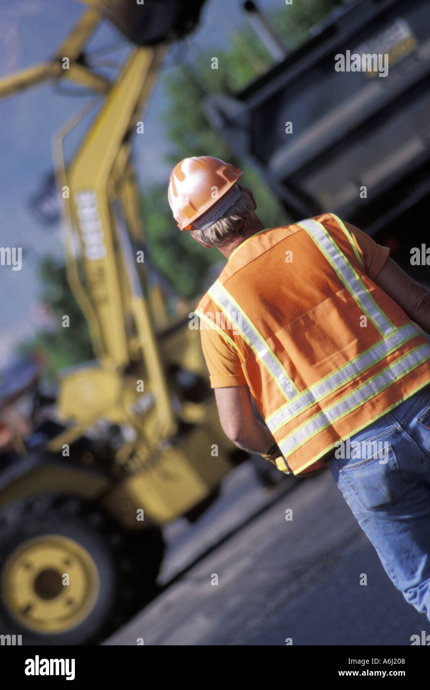 Road Construction Worker and Heavy Equipment Stock Photo - Alamy