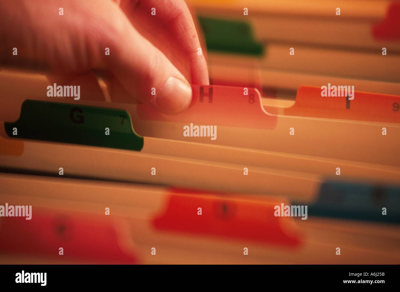 Pulling File From Drawer Stock Photo - Alamy