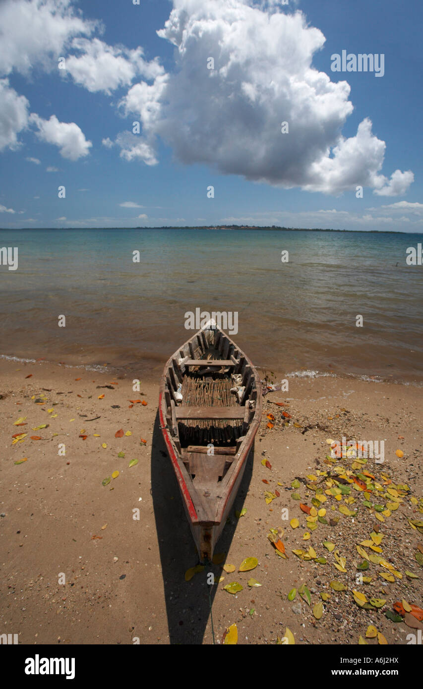 Fishing boat on beach Stock Photo - Alamy
