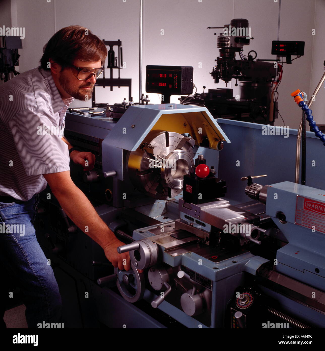 Machine working men hi-res stock photography and images - Alamy