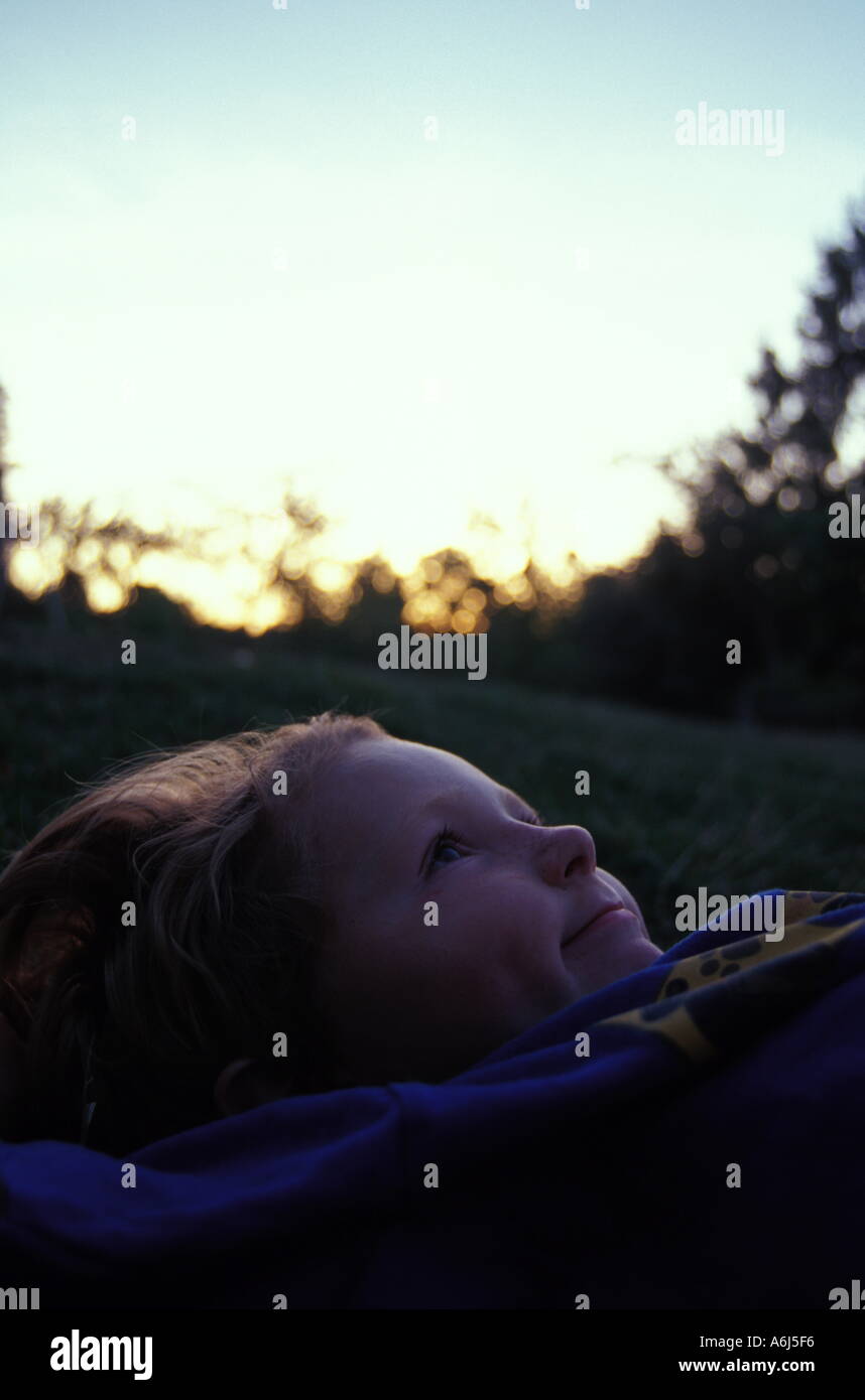 Little Kid Staring at the Sky Stock Photo - Alamy