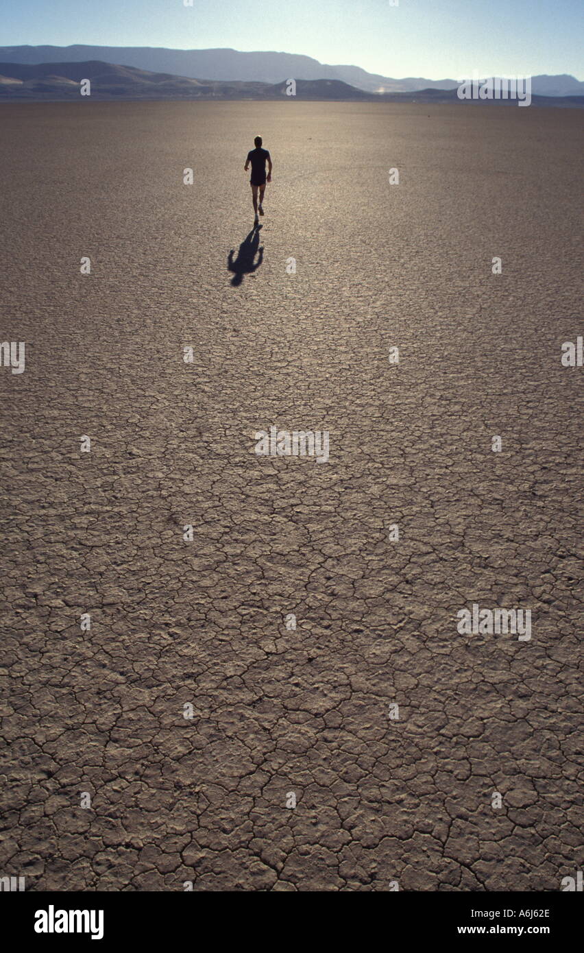 Running on Dry Flat Earth Stock Photo - Alamy
