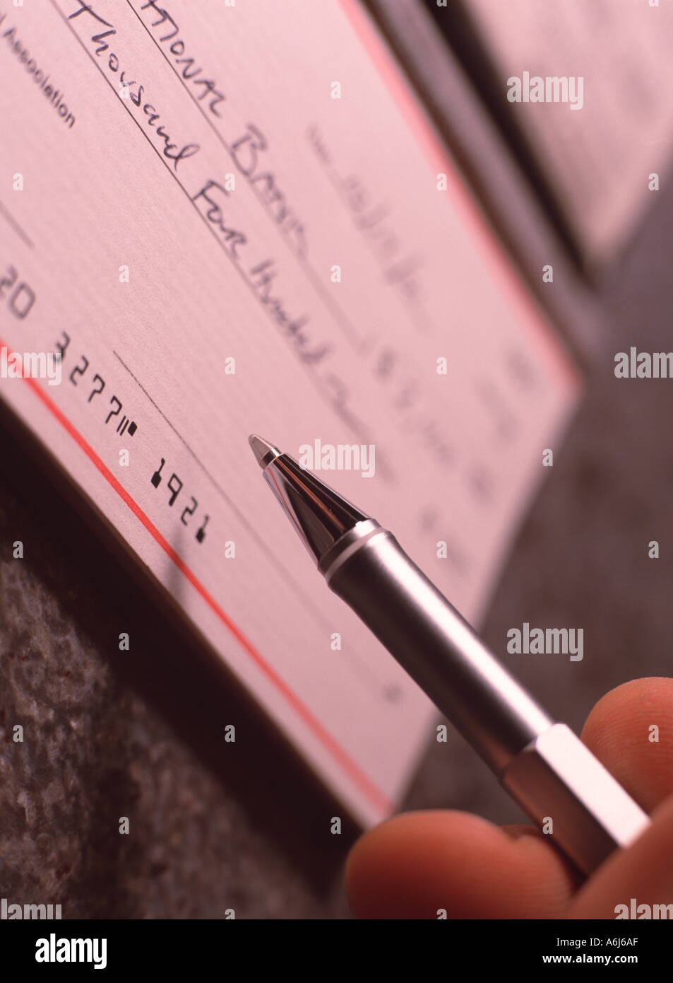 Writing a Check Stock Photo - Alamy