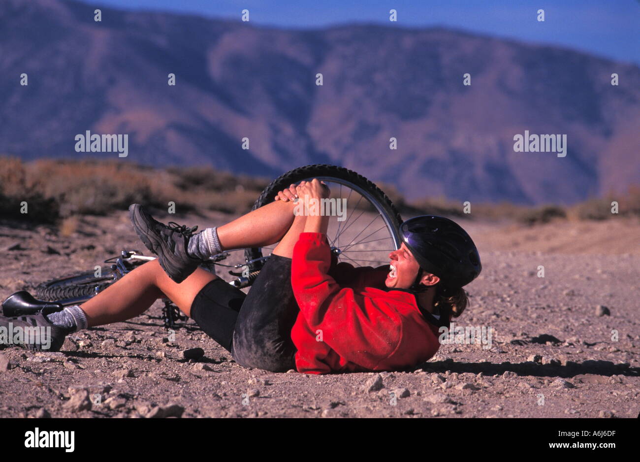 Woman fall bike accident hi-res stock photography and images - Alamy