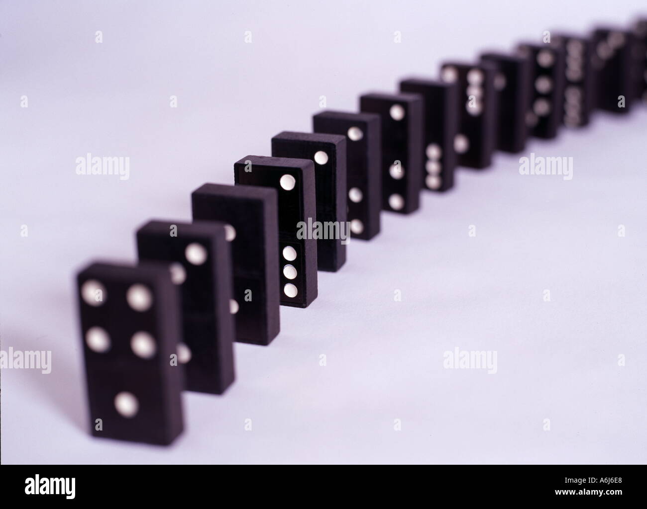 Dominoes Lined Up Stock Photo - Alamy