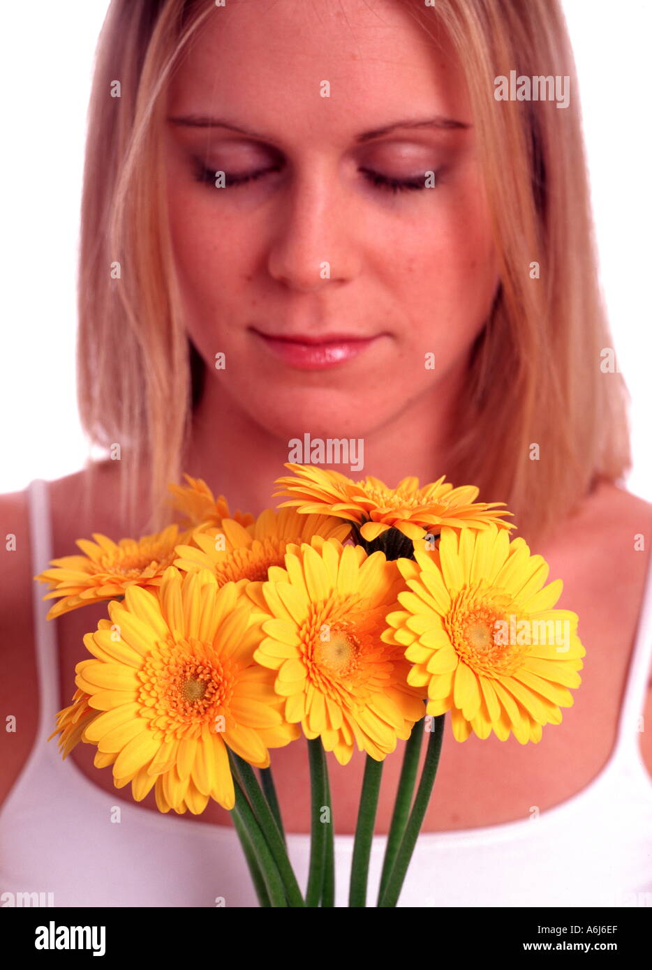 Lady smelling plants hi-res stock photography and images - Alamy