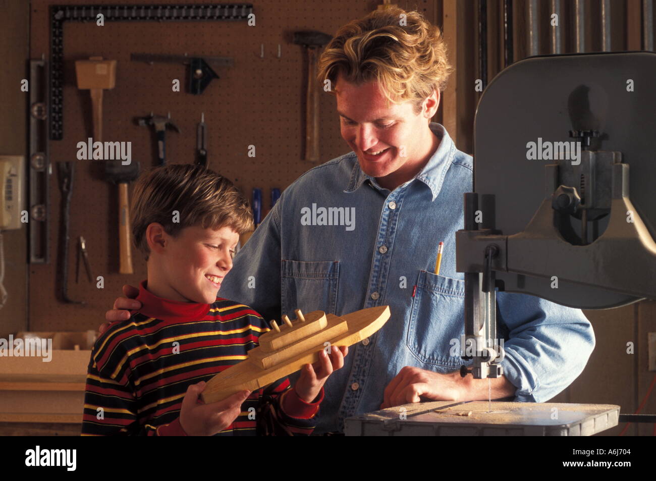 Father and Son in Wood Shop Stock Photo - Alamy