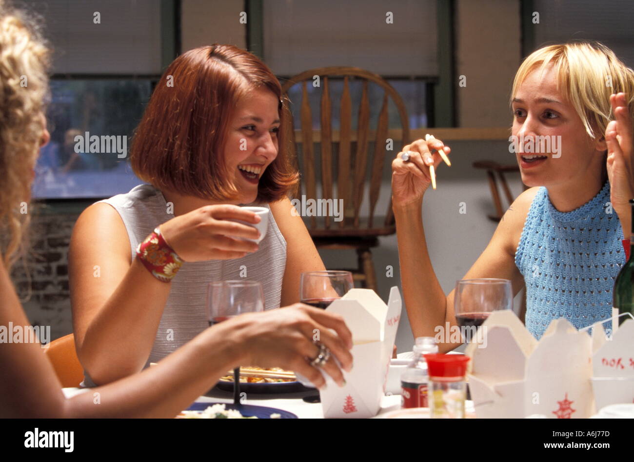 Young Women Having Dinner Party Stock Photo - Alamy