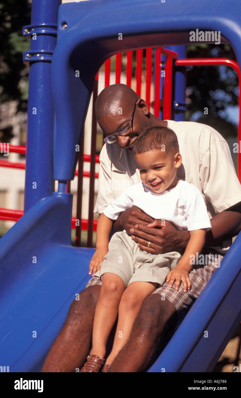 Father and Son Playing in Playground Stock Photo - Alamy