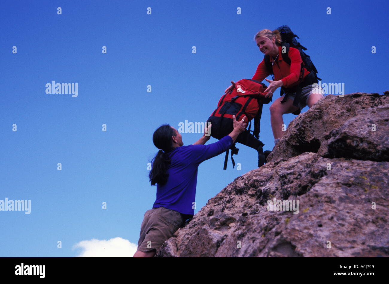 Handing backpack hi-res stock photography and images - Alamy