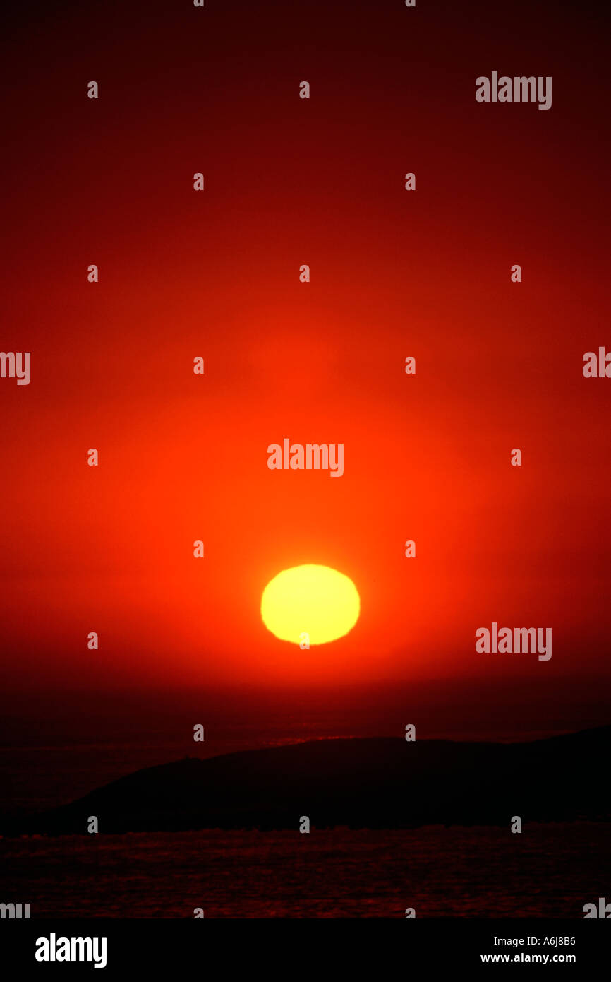 Sun setting over the horizon in South Africa Stock Photo - Alamy