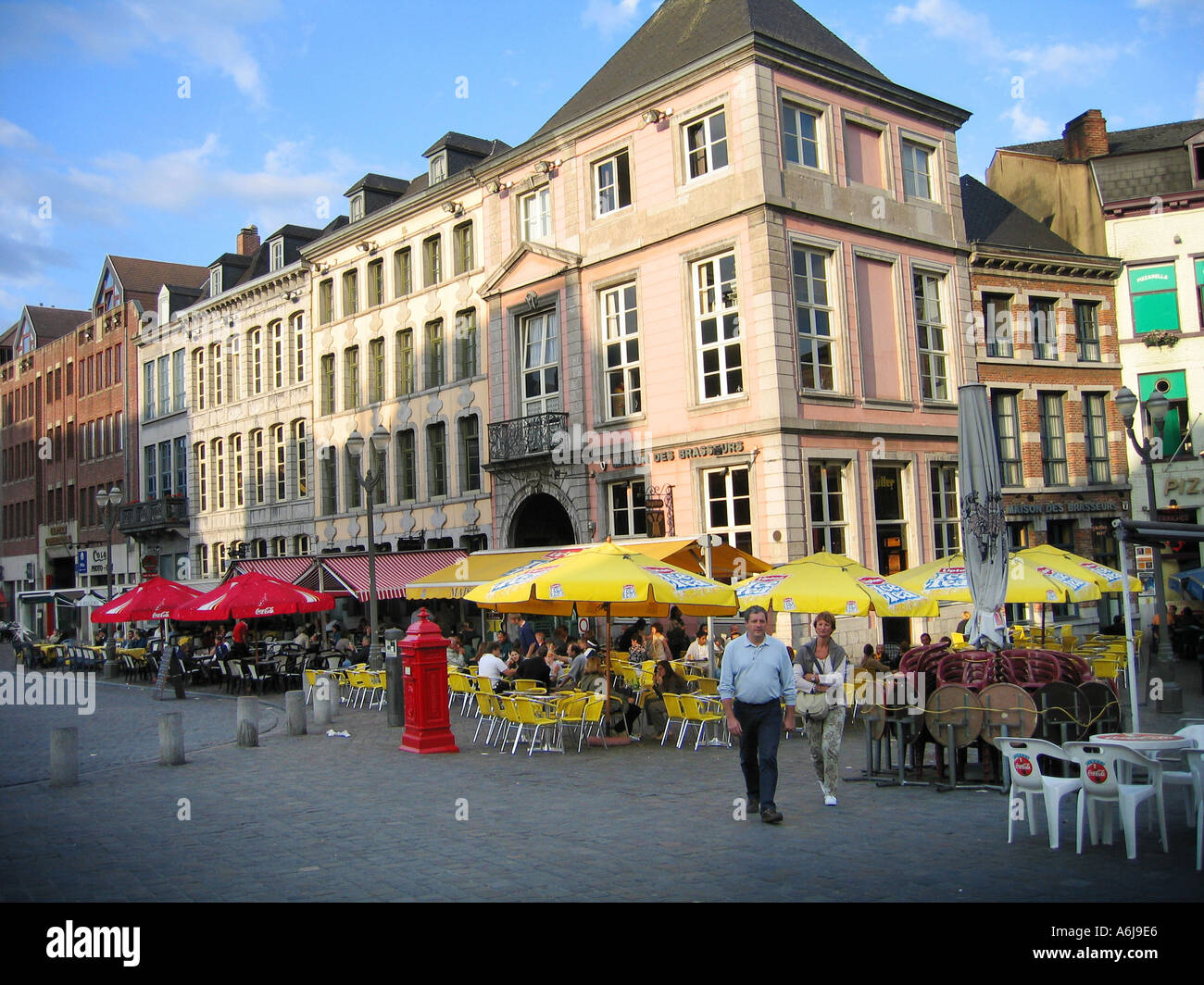 People eating at restaurants on the Grand Place Square in the city of ...
