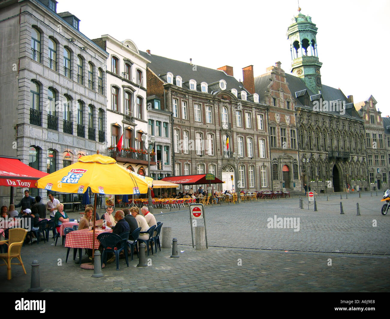 People eating at restaurants on the Grand Place Square in the city of ...