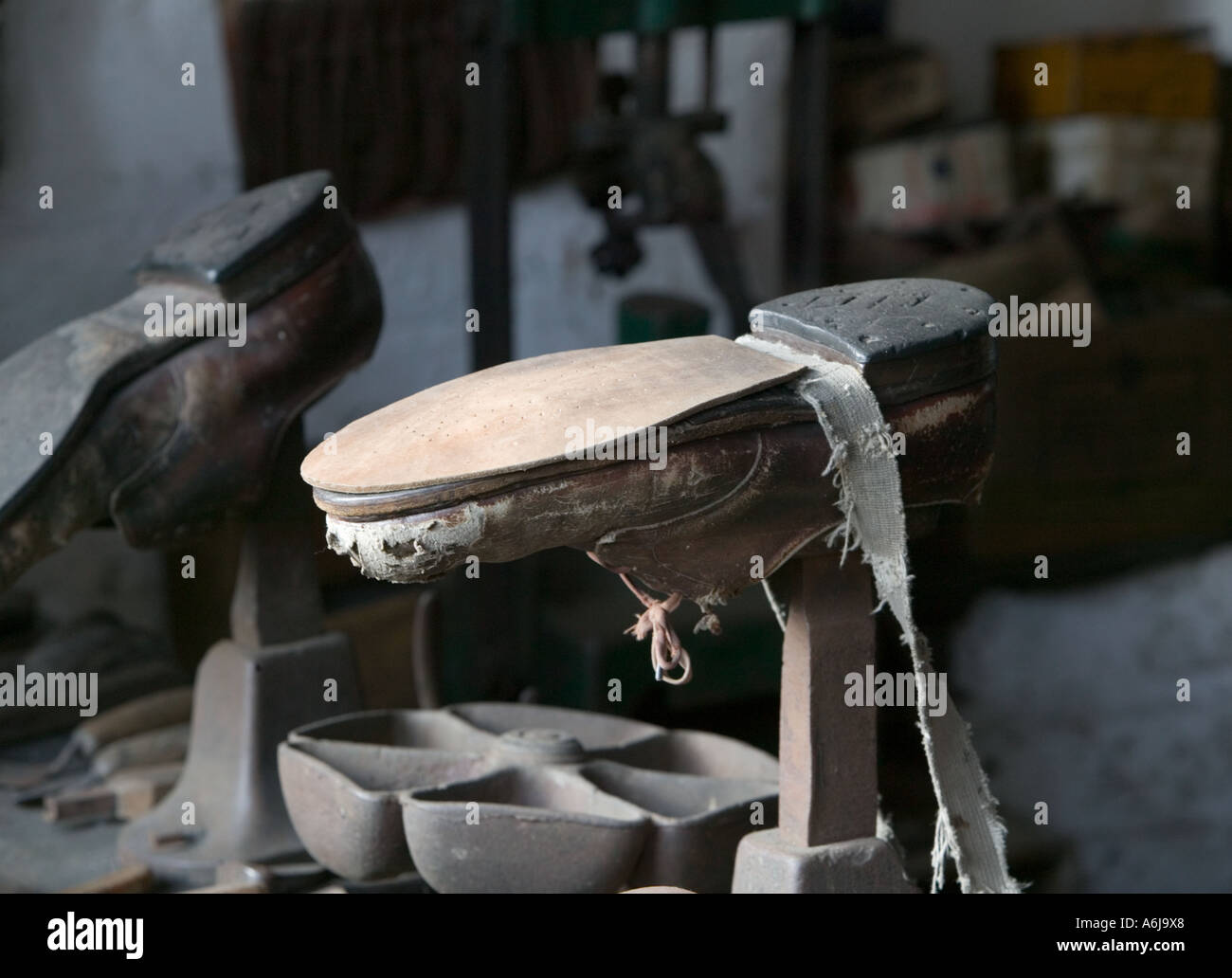 A Cobblers Hobin Foot with a shoe for repair in a cobblers shop from ...