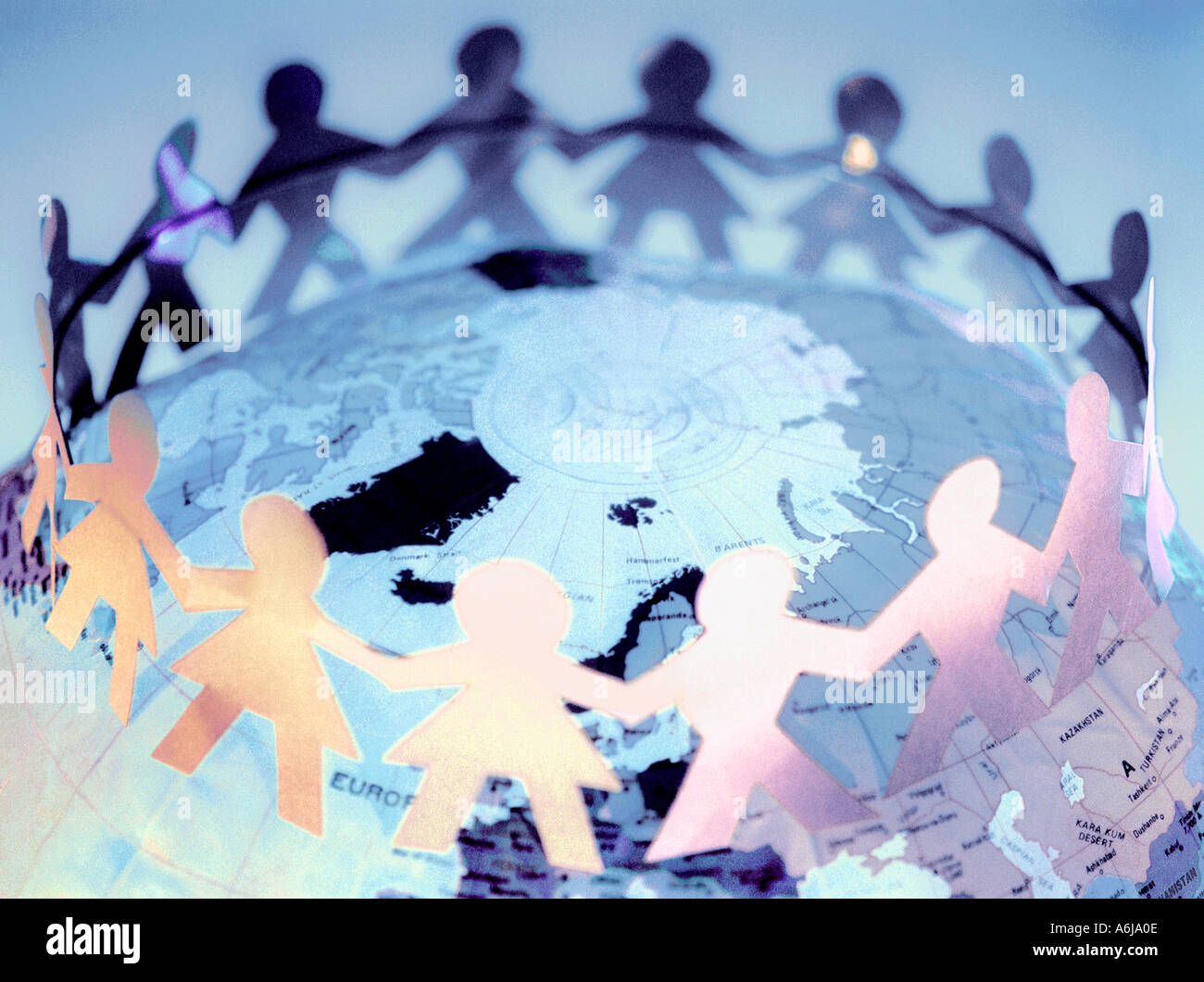 Paper Cut Out People Linking Hands Around A Globe Stock Photo - Alamy