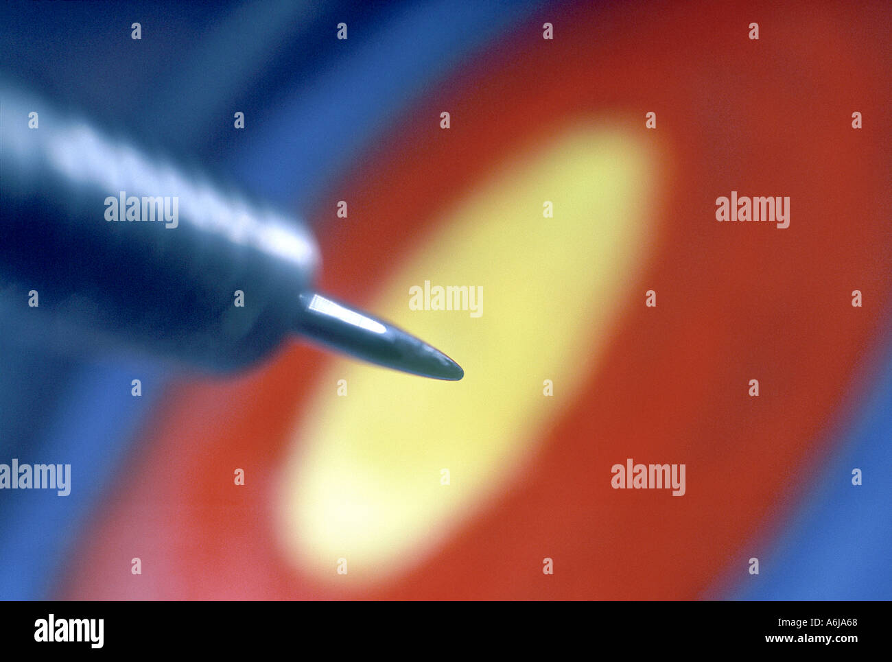 Dart In Flight Towards Bullseye Stock Photo - Alamy