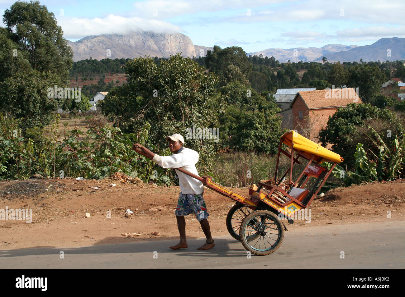 Ambalavao, Madagascar Pousse Pousse driver without a passanger Stock ...