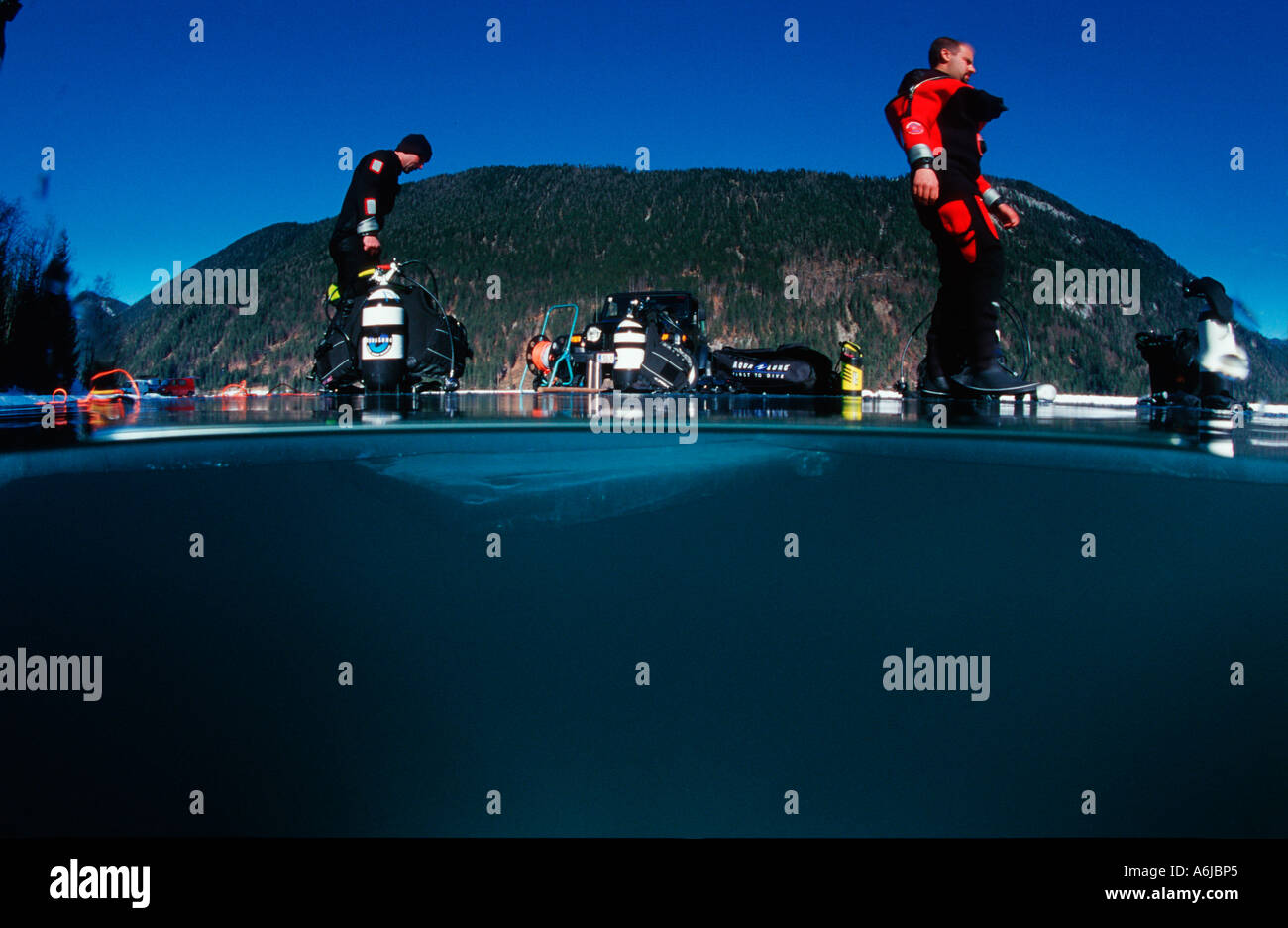 ice diver at the ice hole Stock Photo - Alamy