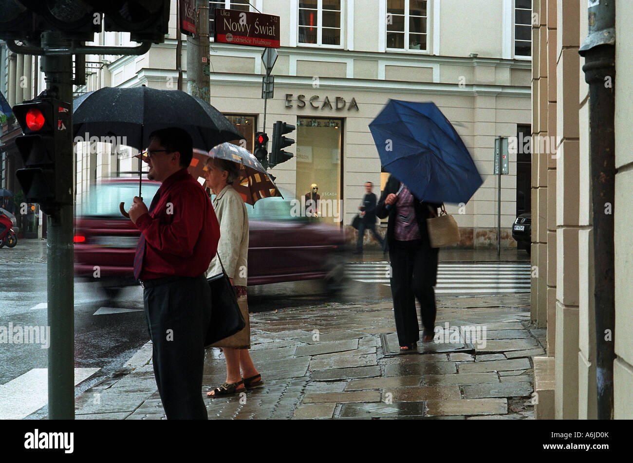 Pedestrians on a rainy day in Warsaw, Poland Stock Photo - Alamy