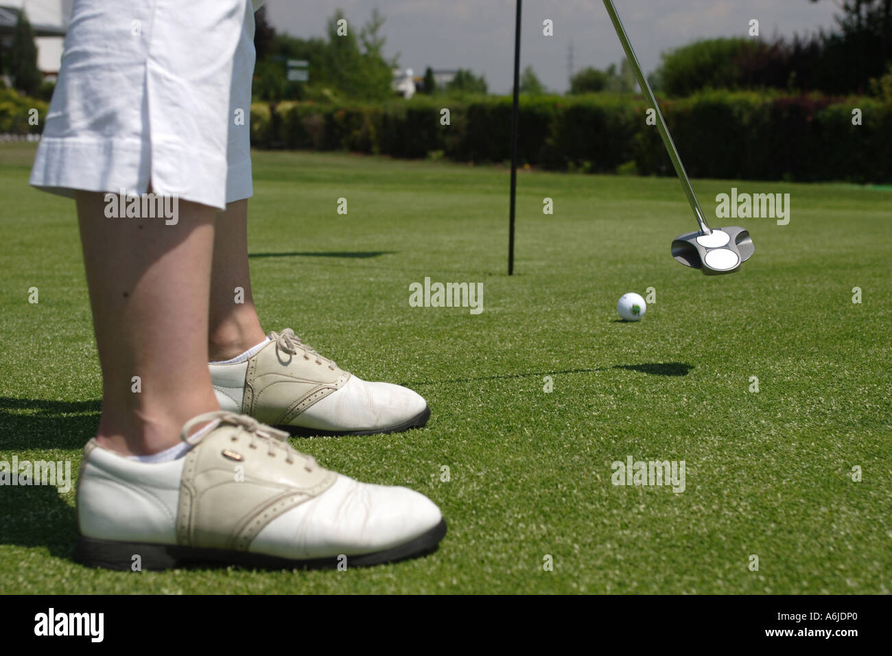 legs of a golf player at a golf course Stock Photo - Alamy