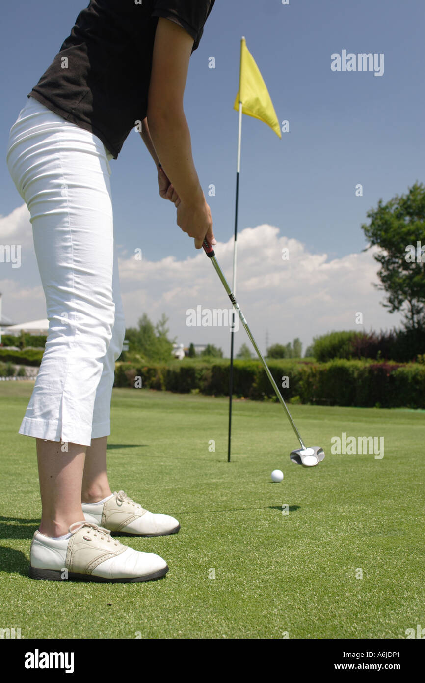 legs of a golf player at a golf course Stock Photo - Alamy