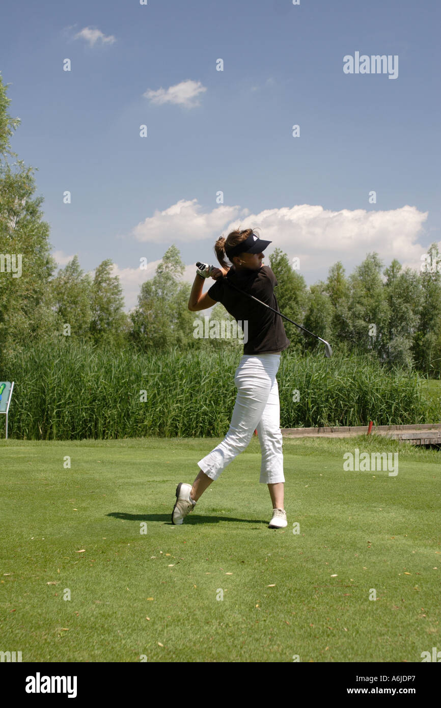 golf player at golf course Stock Photo - Alamy