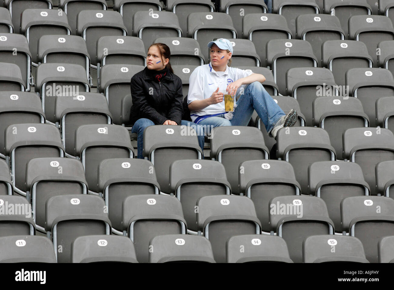 Two teenage girls at a stadium, Berlin, Germany Stock Photo - Alamy