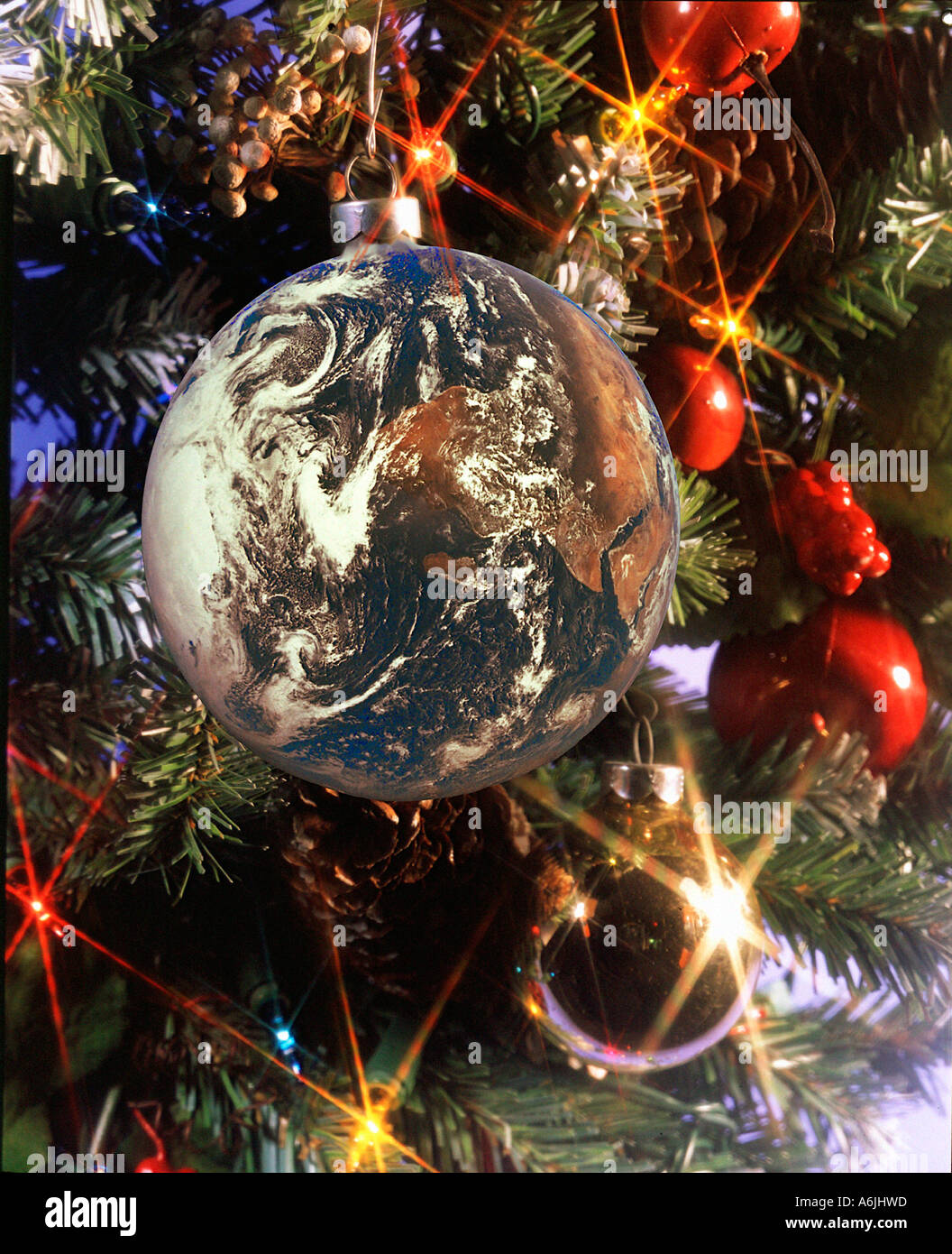 Christmas tree with earth ornament Stock Photo - Alamy