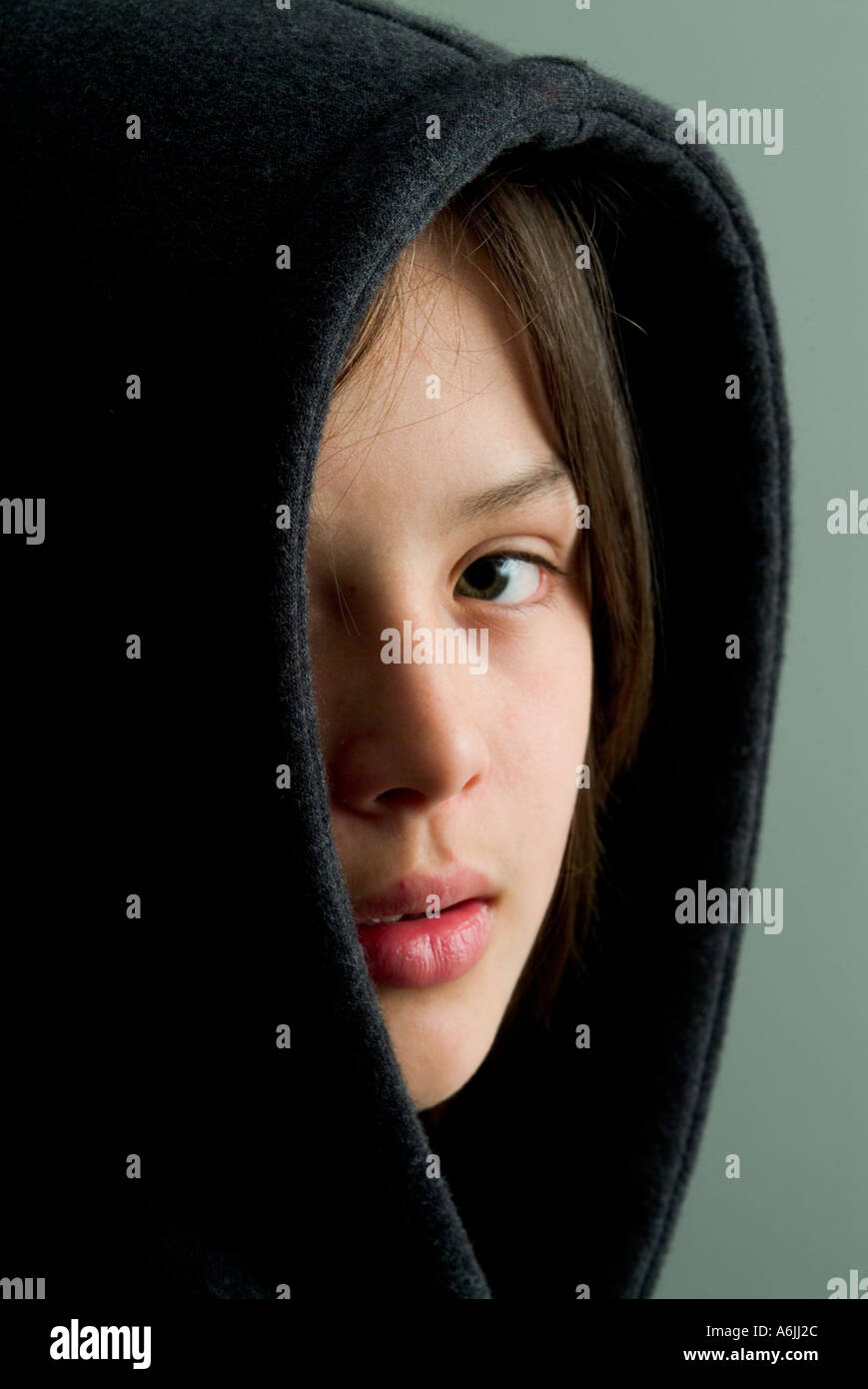 Handsome young 12 year old boy wearing a hoodie Stock Photo - Alamy
