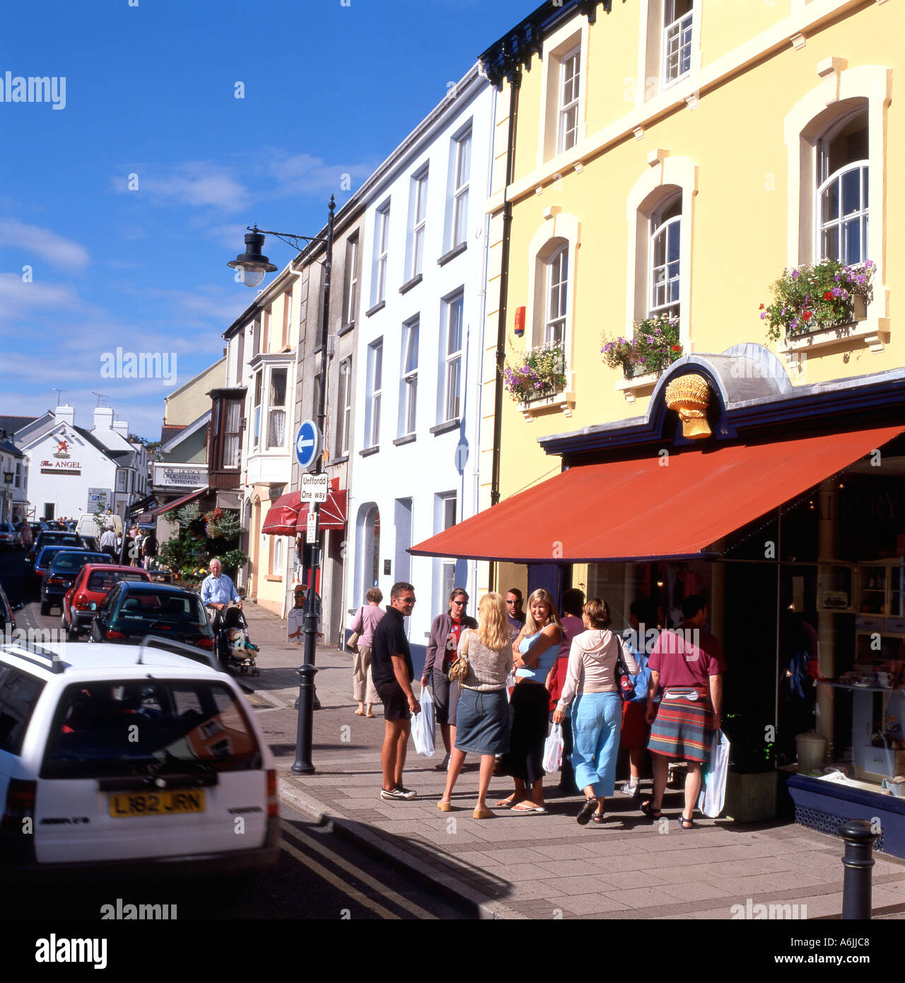 People talking in the street outside a shop in Narberth town centre in ...