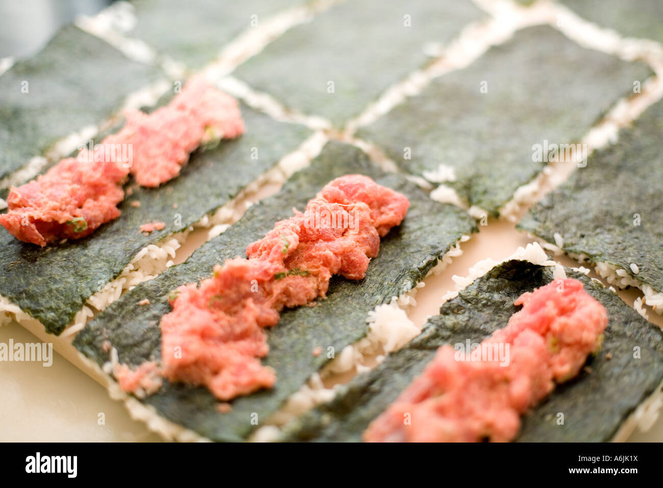 Sushi with tuna spread on seaweed and rice Stock Photo - Alamy