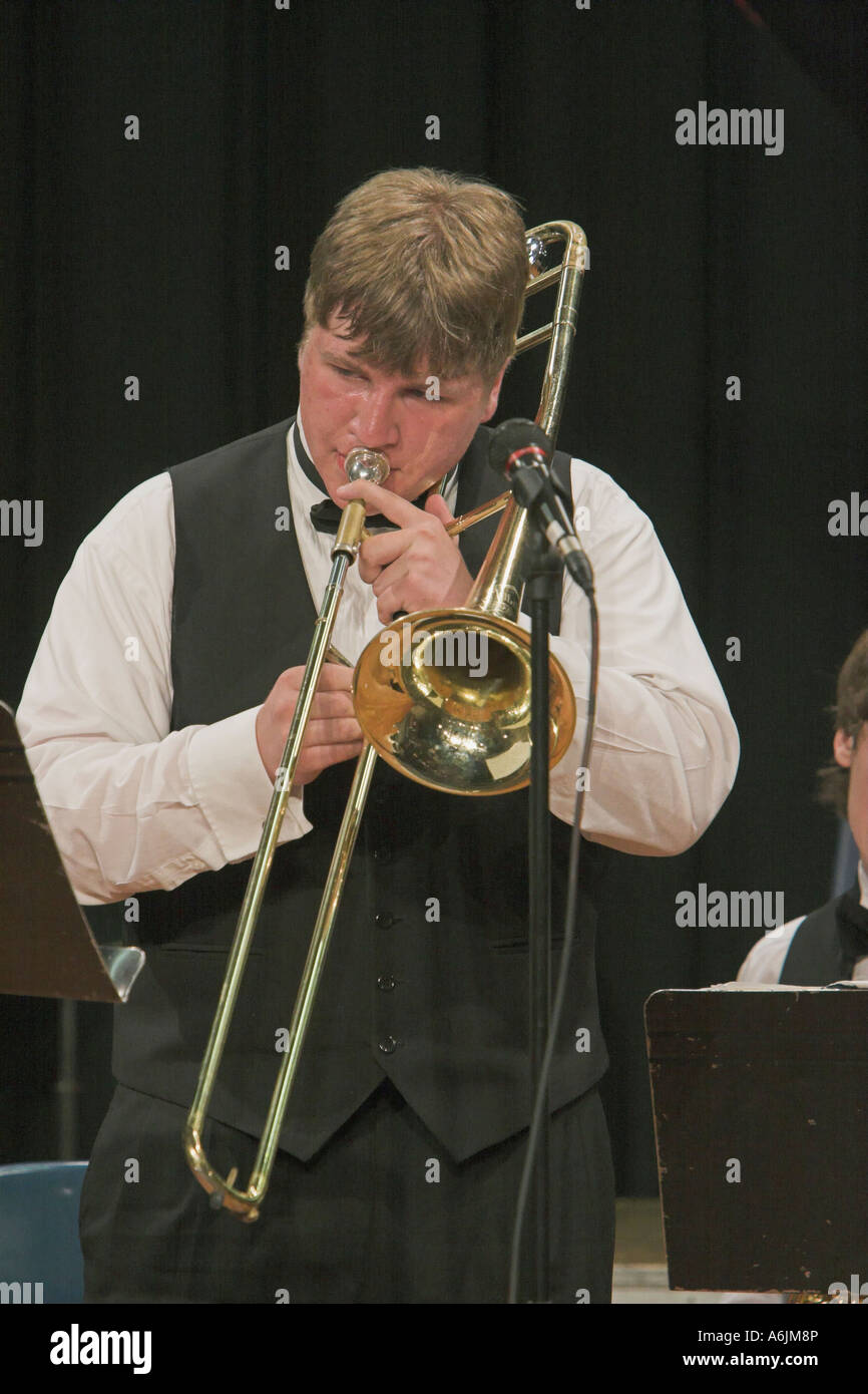 Boy playing the trombone hi-res stock photography and images - Alamy