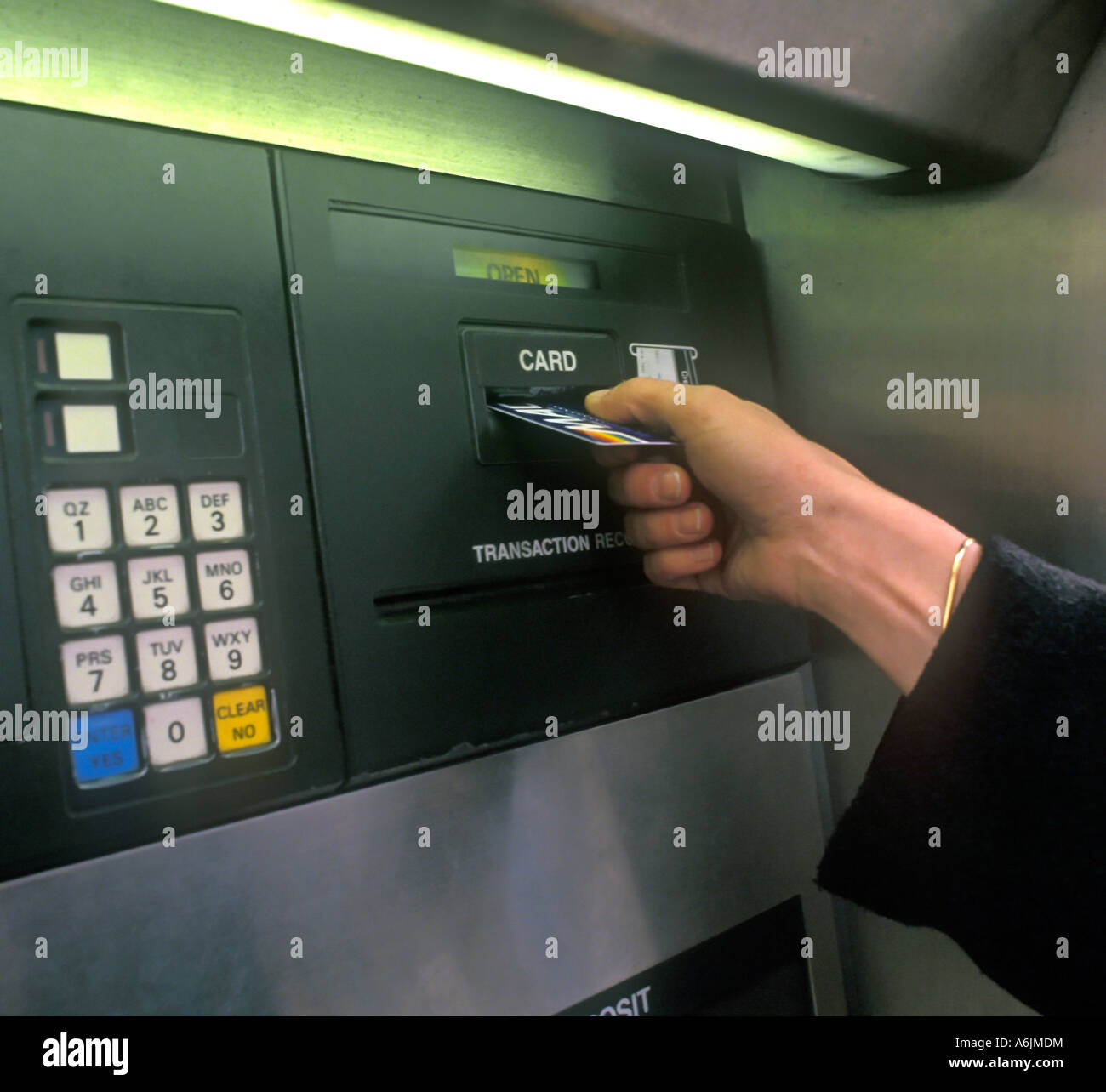 Taking money from bank teller hi-res stock photography and images - Alamy