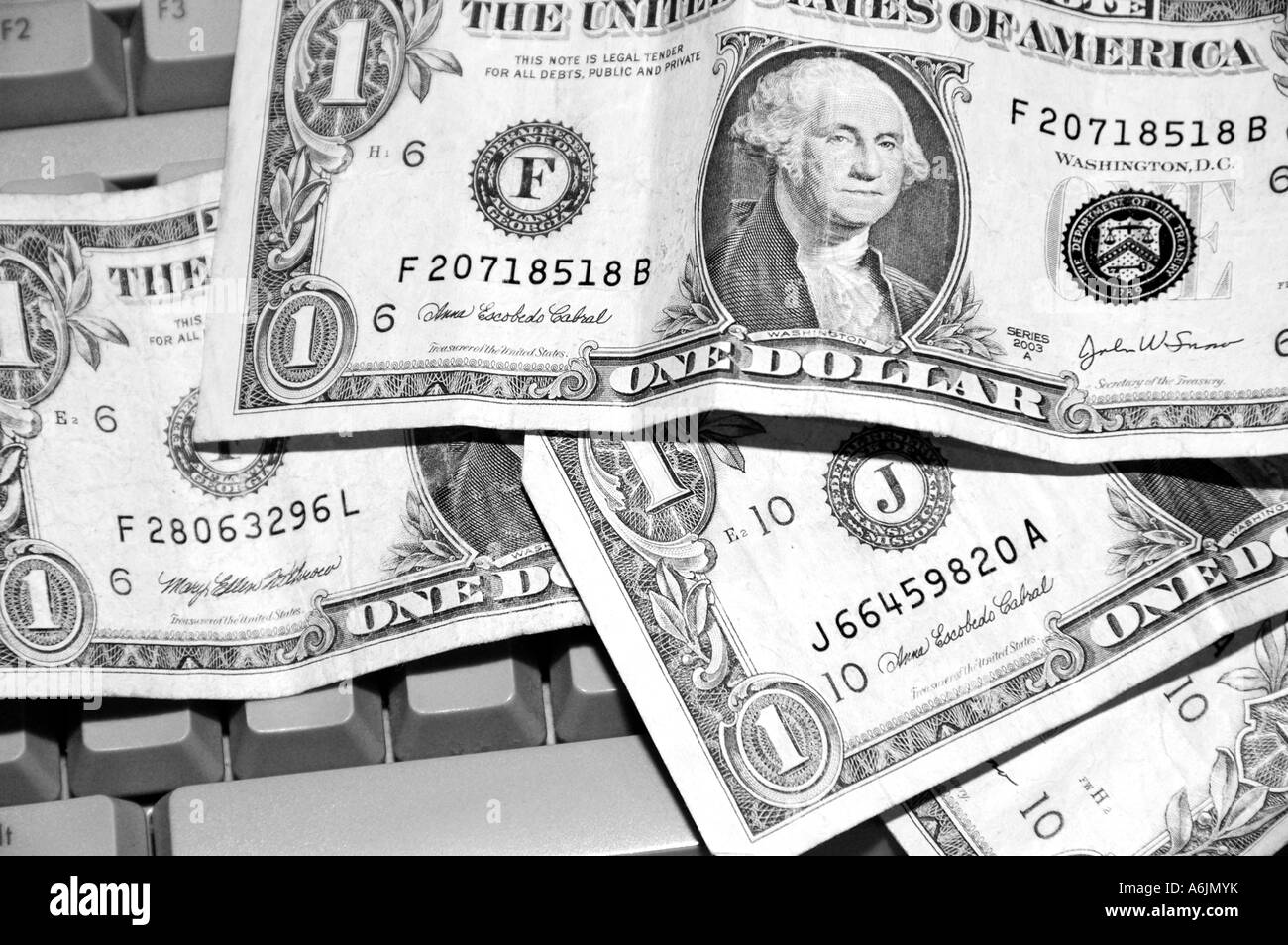 American currency on keyboard Stock Photo - Alamy