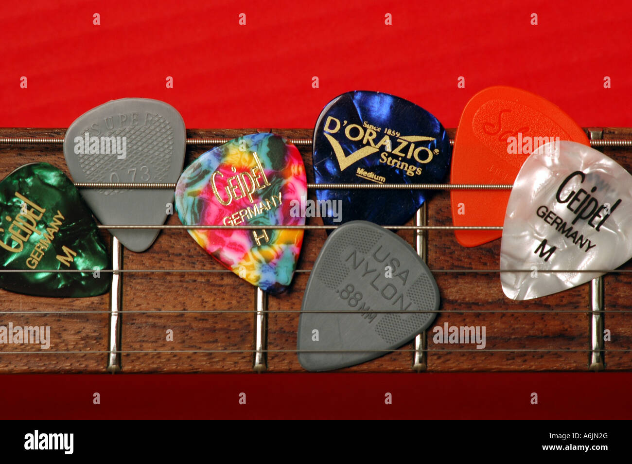 Colorful picks on guitar showing their thickness Stock Photo - Alamy