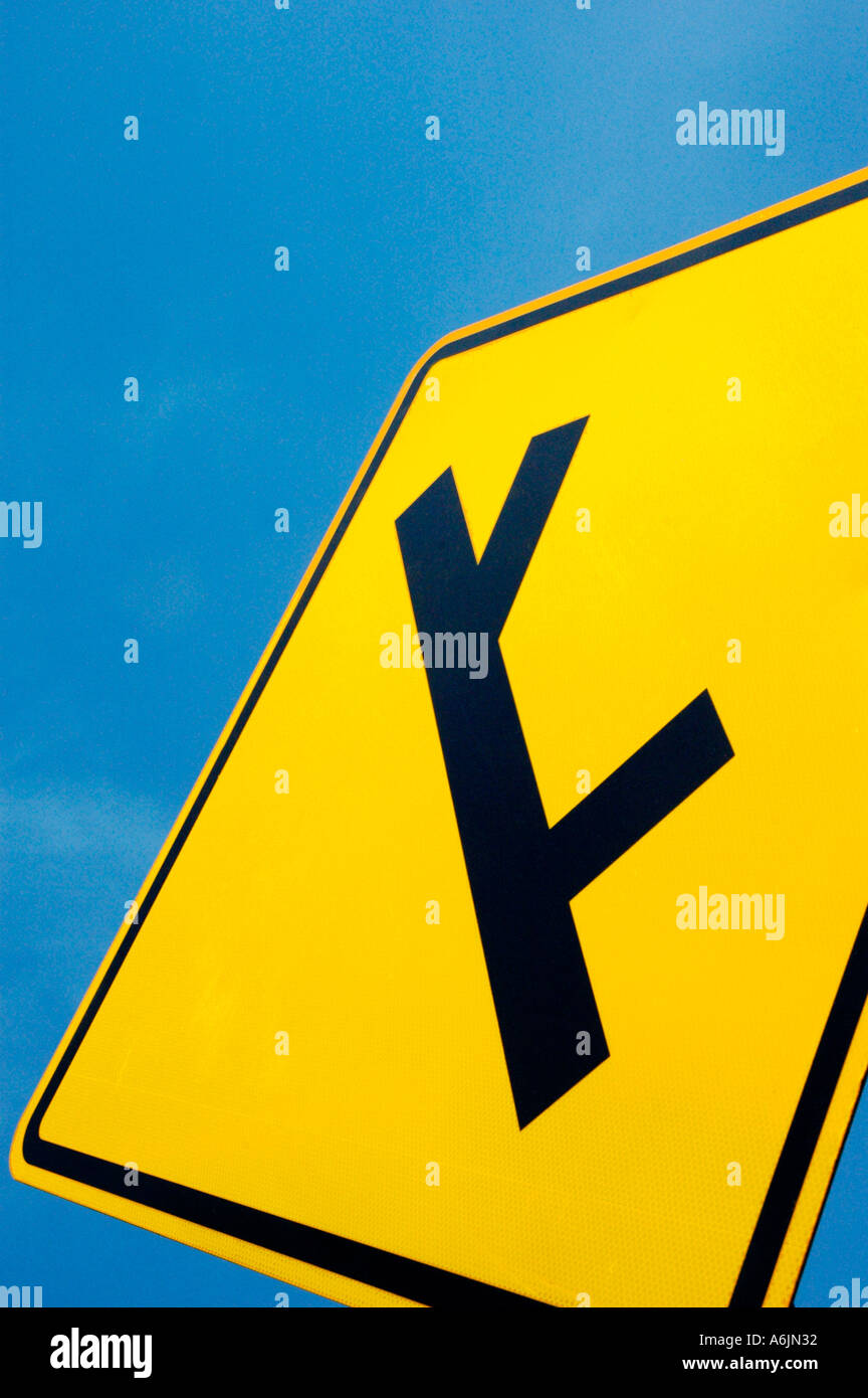 Side road warning sign for right hand oncoming traffic Stock Photo - Alamy