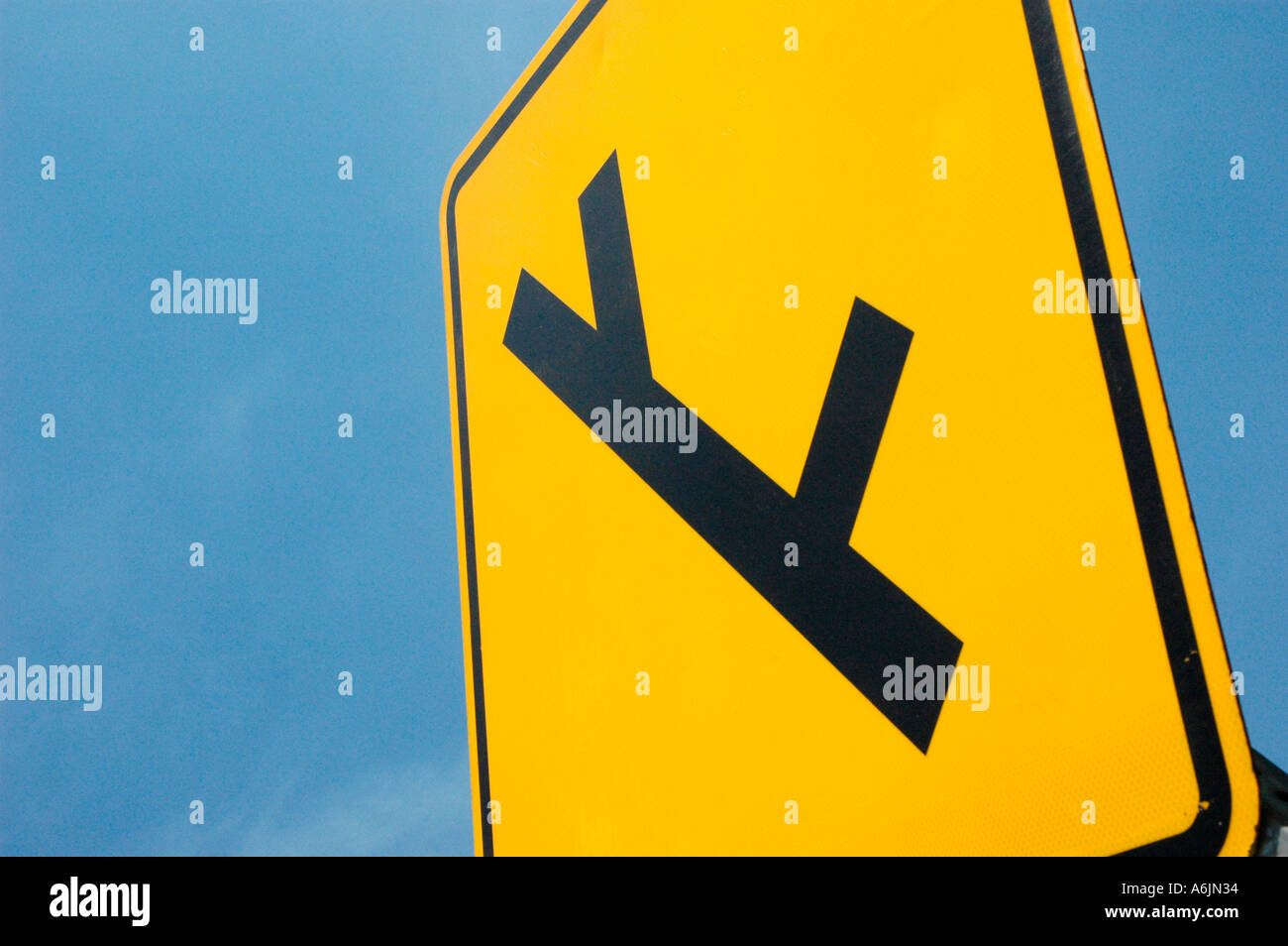 Side road warning sign for right hand oncoming traffic Stock Photo - Alamy