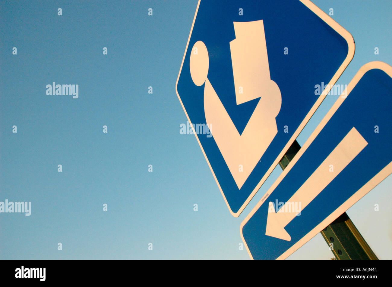 Library reading sign showing way to facility Stock Photo - Alamy